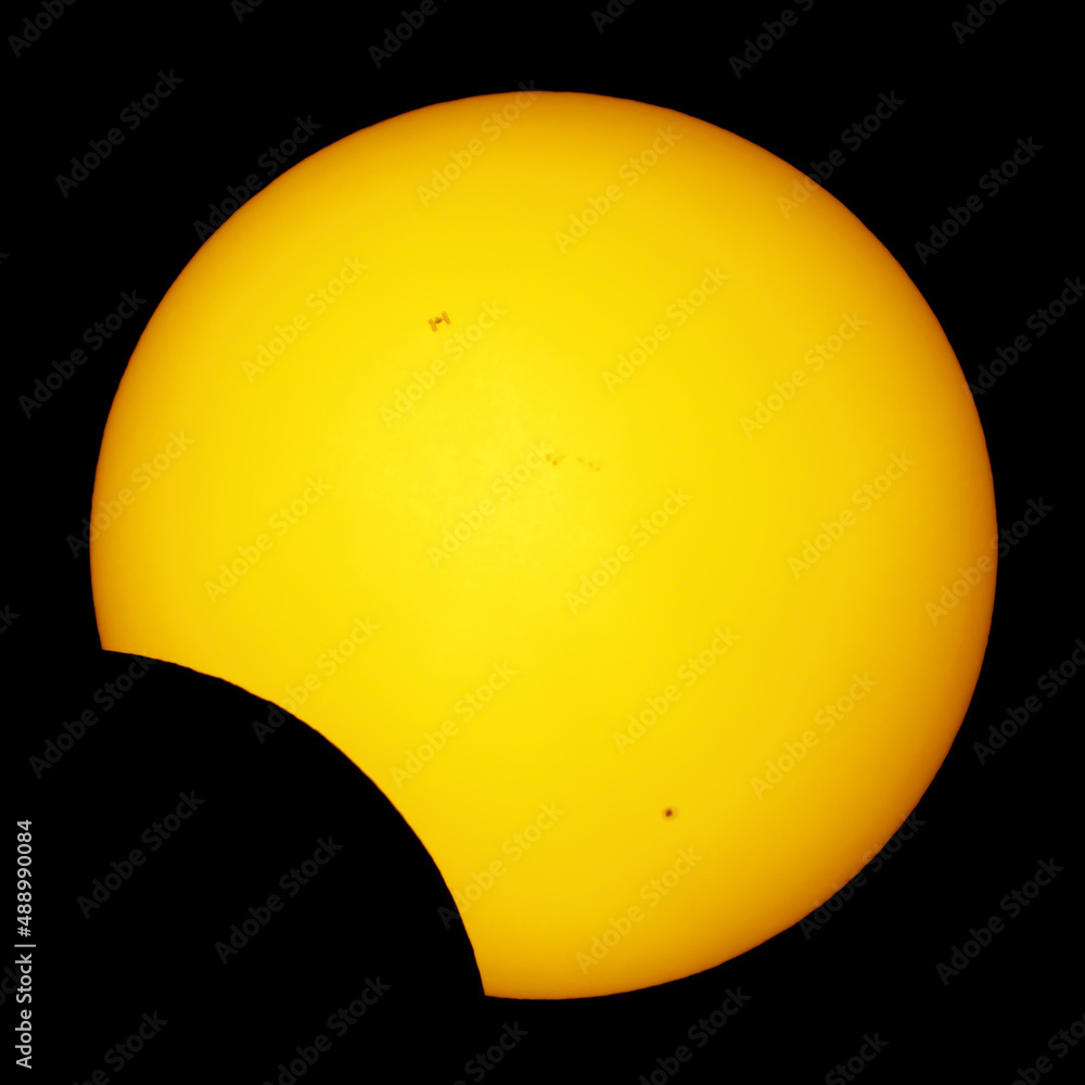 Solar Eclipse photo from space, the Moon is passing between the Sun and ...