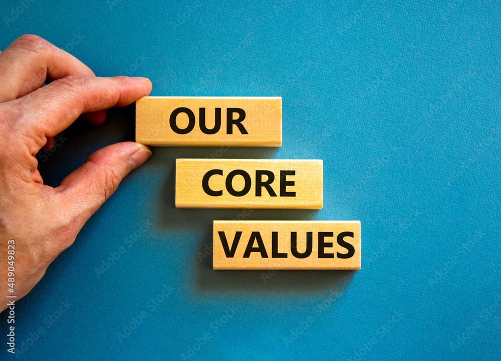 Our core values symbol. Concept words Our core values on wooden blocks ...