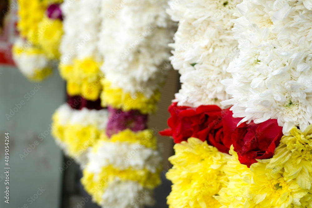 Colorful flower garlands on display in a shop in Little India, Ipoh ...