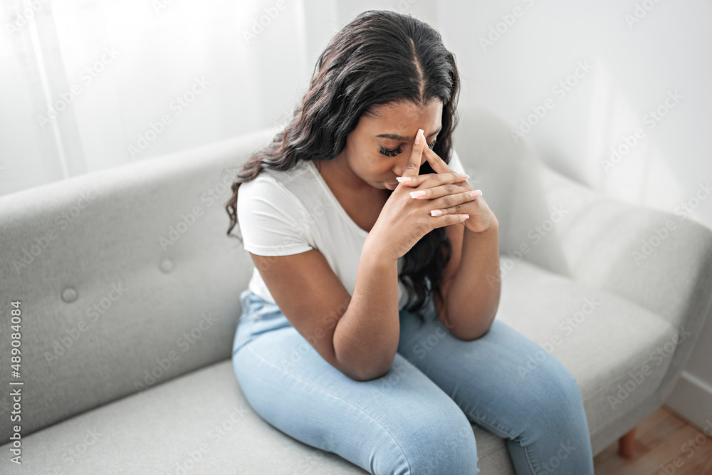 Stressed miserable black woman suffer from grief problem, depressed ...