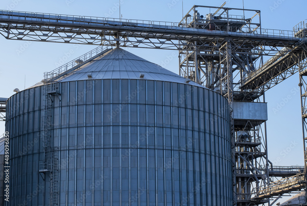 Gigantic metal silo (huge metal tank for sugar, silage or grain storage ...