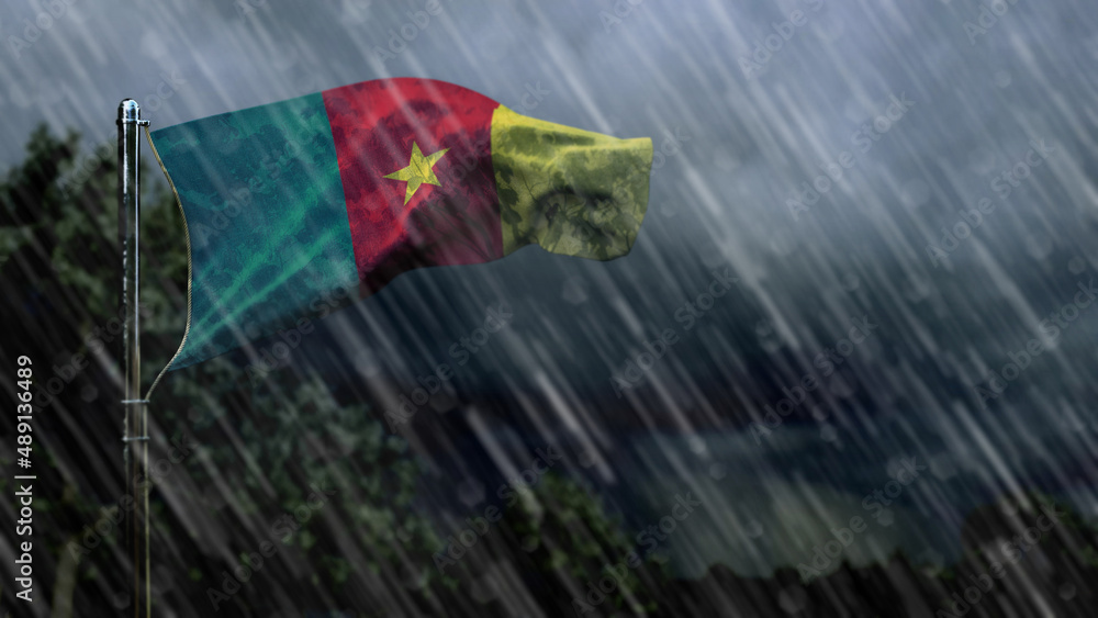 flag of Cameroon with rain and dark clouds, windstorm forecast symbol ...