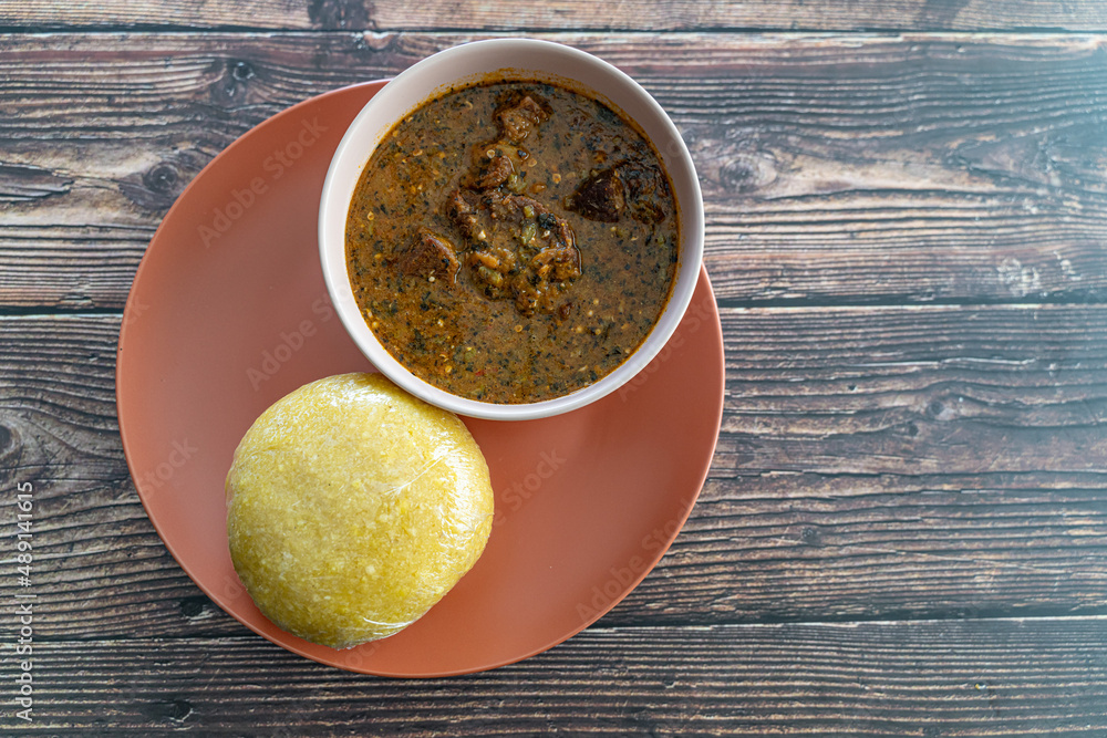 Nigerian Eba or Garri Served with Ogbono Soup for lunch Stock Photo ...