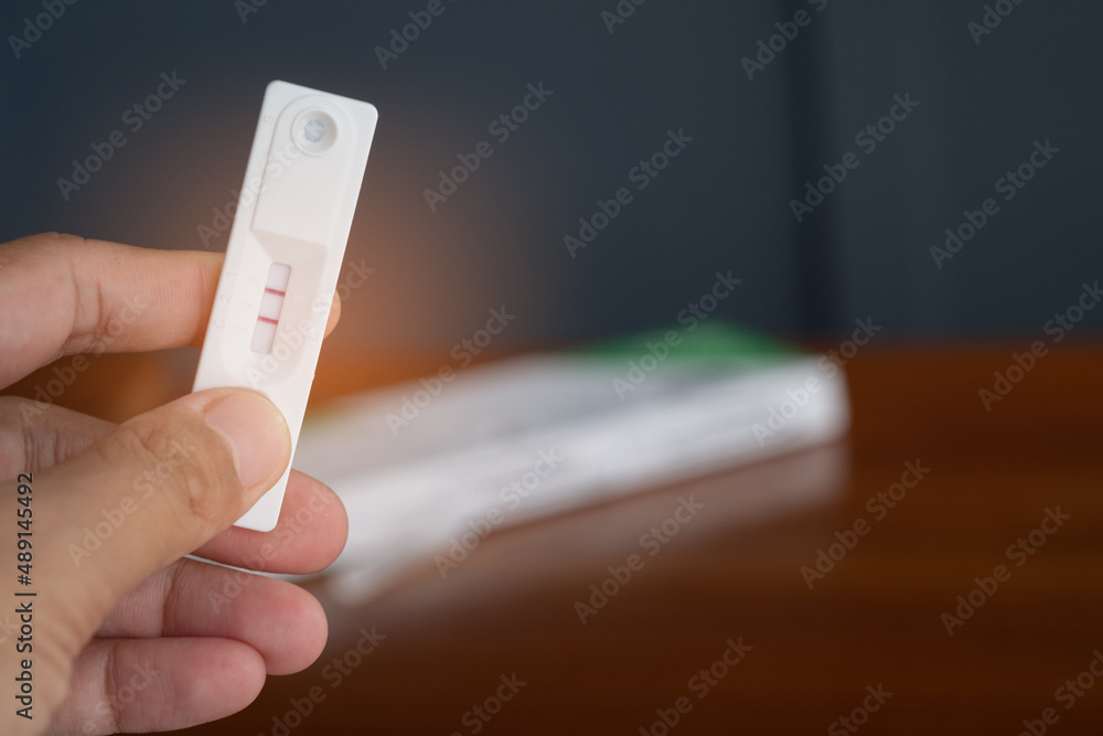 covid-19 positive test result with antigen rapid test kit (ATK), The ...