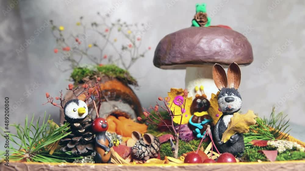 Animals and a mushroom are made of plasticine. Children's hobby ...