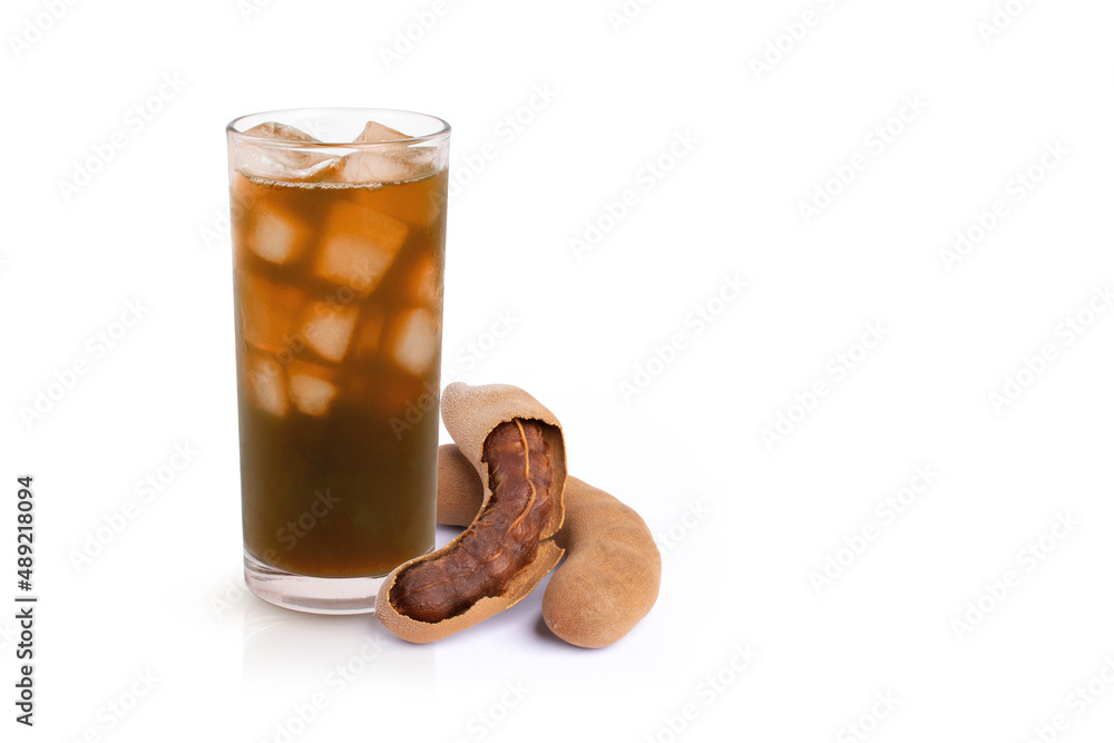 Tamarind juice and fresh tamarind fruit isolated on white background ...