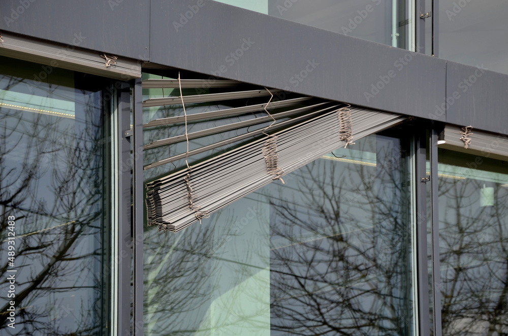 service of blinds on buildings. adjustment and tuning and maintenance ...