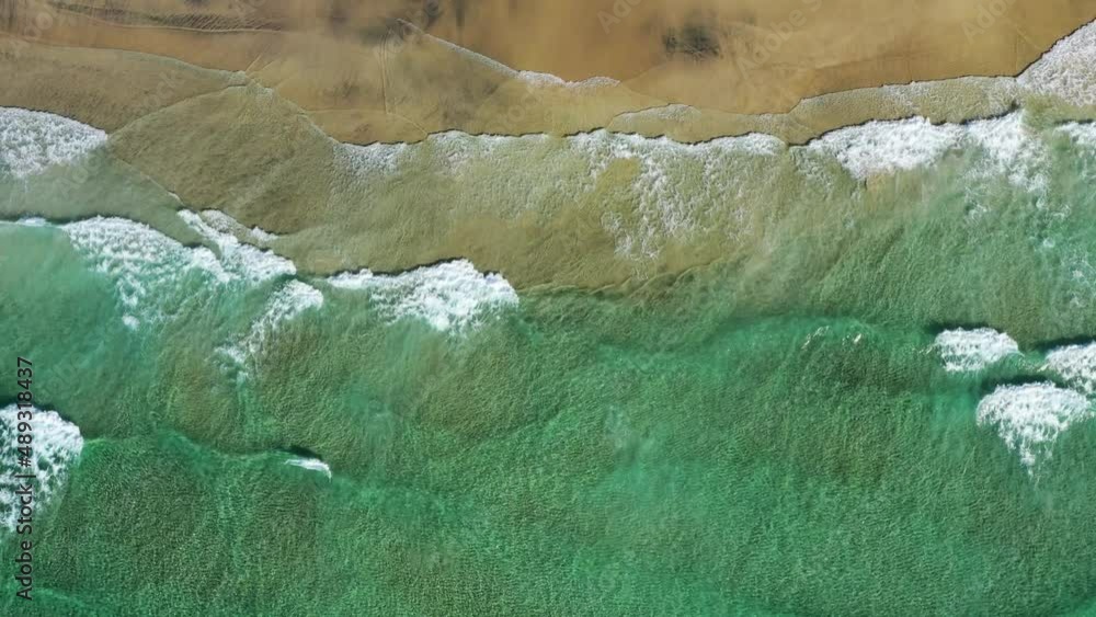 Top down View on the sand Beach with Splashing Sea Waves.Aerial view of ...