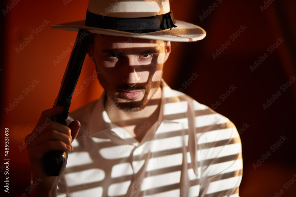 mafioso with a gun Stock Photo | Adobe Stock