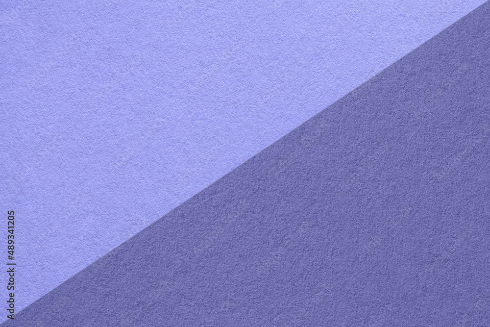 Texture of blue paper background, half two colors, macro. Very peri ...