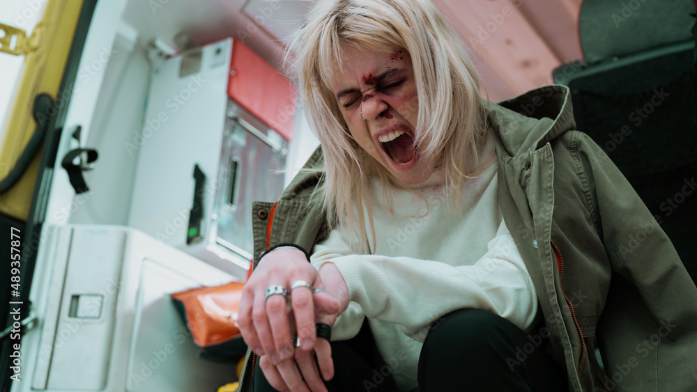 Foto de Young Caucasian Female Screaming in Agony, Face Covered In ...