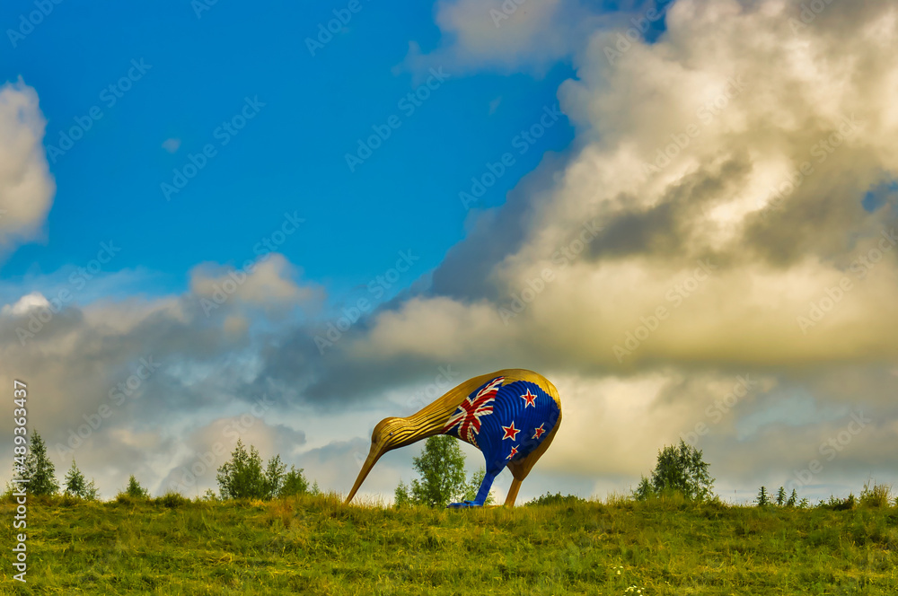 Giant iron kiwi in the colours of the New Zealand flag. In Otorohanga ...