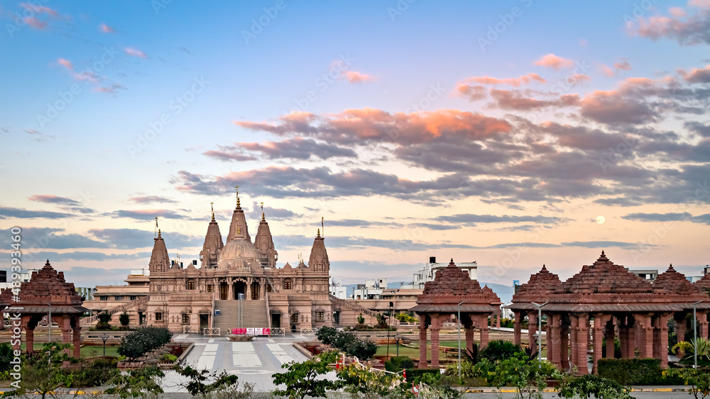 Beautiful colorful sky over Shree Swaminarayan temple in Pune ...