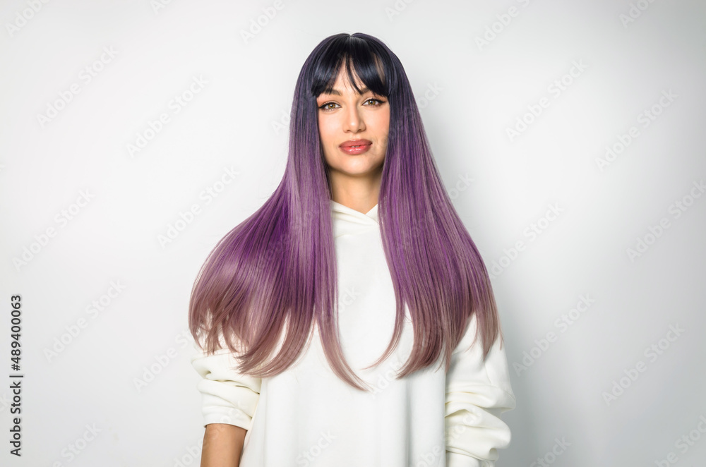 Beautiful young woman with perfect skin and long shiny purple hair at ...