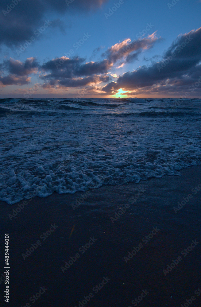 atardecer azul en la playa Stock Photo | Adobe Stock