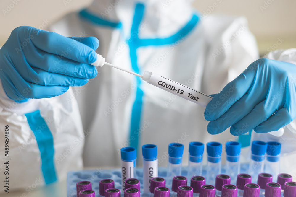 Process of coronavirus PCR antigen testing examination by nurse medic ...