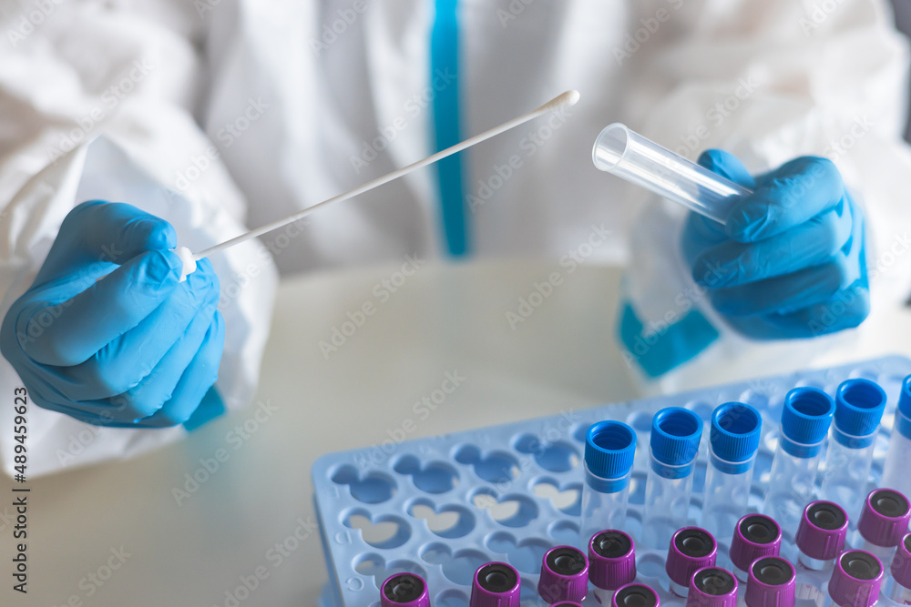Process of coronavirus PCR antigen testing examination by nurse medic ...