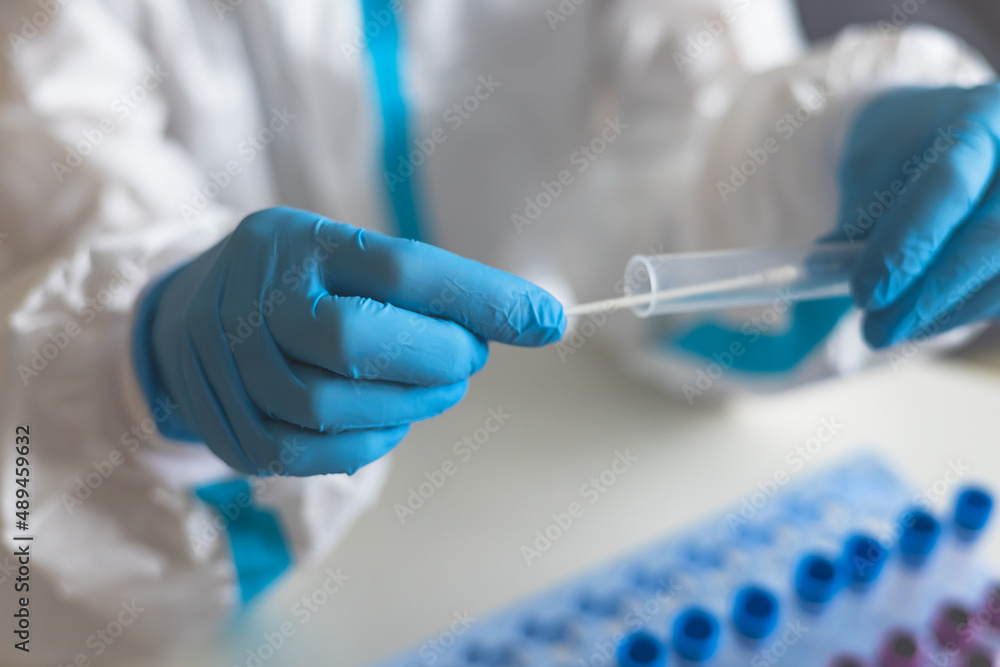 Process of coronavirus PCR antigen testing examination by nurse medic ...