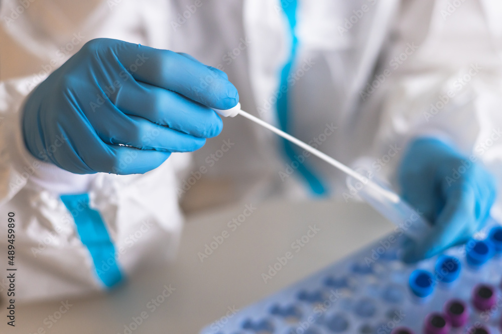 Process of coronavirus PCR antigen testing examination by nurse medic ...