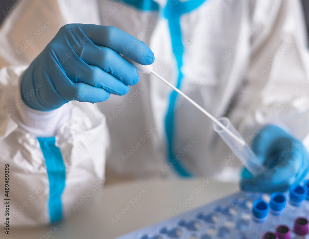 Process of coronavirus PCR antigen testing examination by nurse medic ...