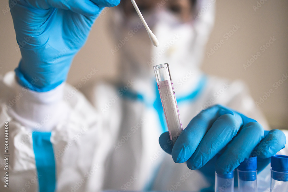 Process of coronavirus PCR antigen testing examination by nurse medic ...