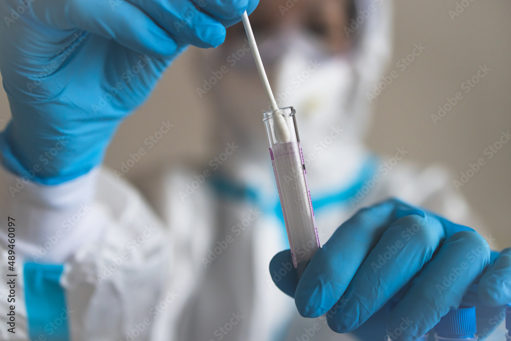Process of coronavirus PCR antigen testing examination by nurse medic ...