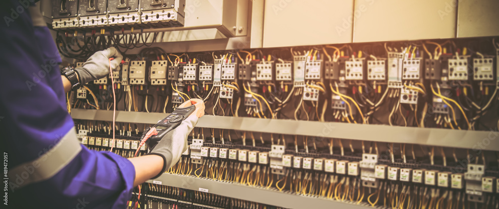 Electricity and electrical maintenance service, Engineer hand holding ...