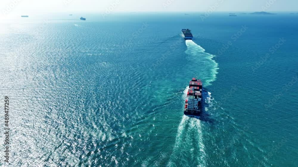 Stern of large cargo ship running in the ocean blue sea , container ...