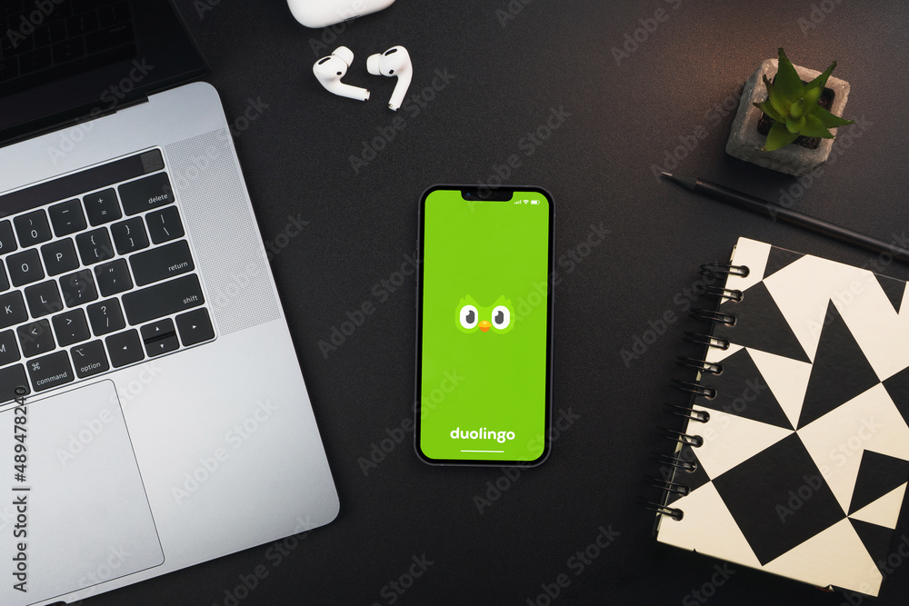 Duolingo language-learning app on the smartphone screen on black ...