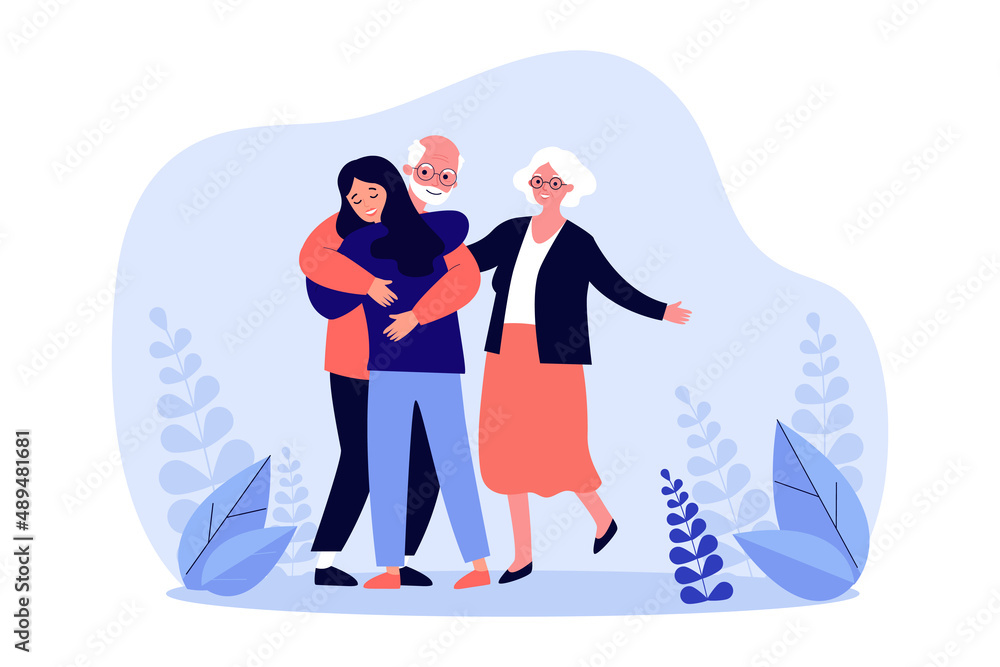 Adult daughter hugging old father. Woman visiting parents or ...