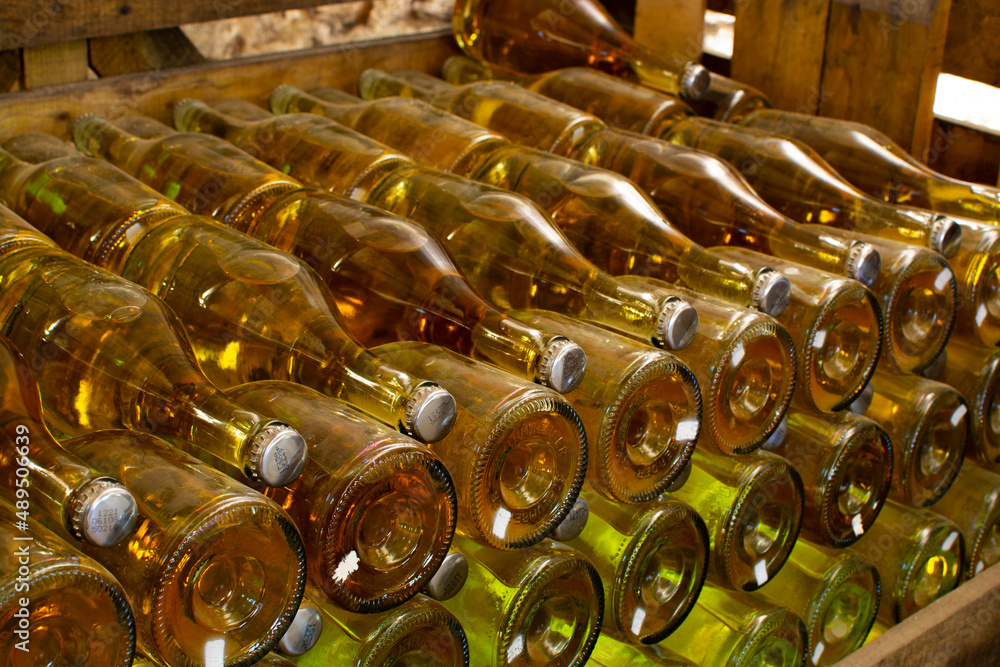 Sparkling wine production by traditional method in underground cellars ...