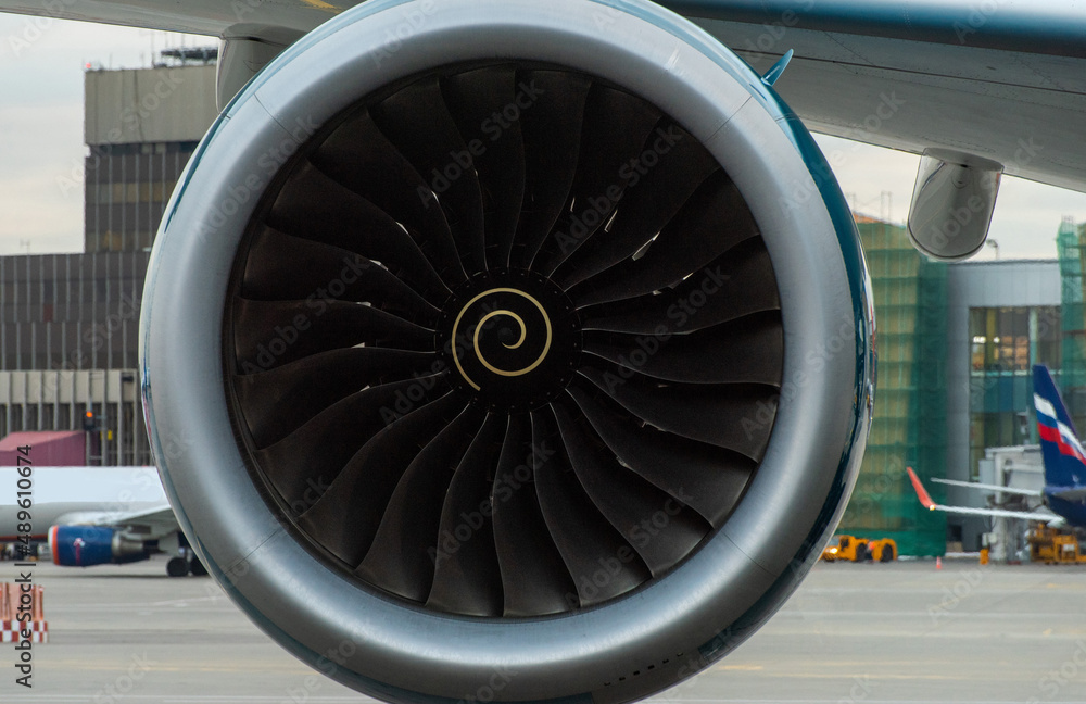 Turbine engine of a modern jet passenger aircraft at an international ...