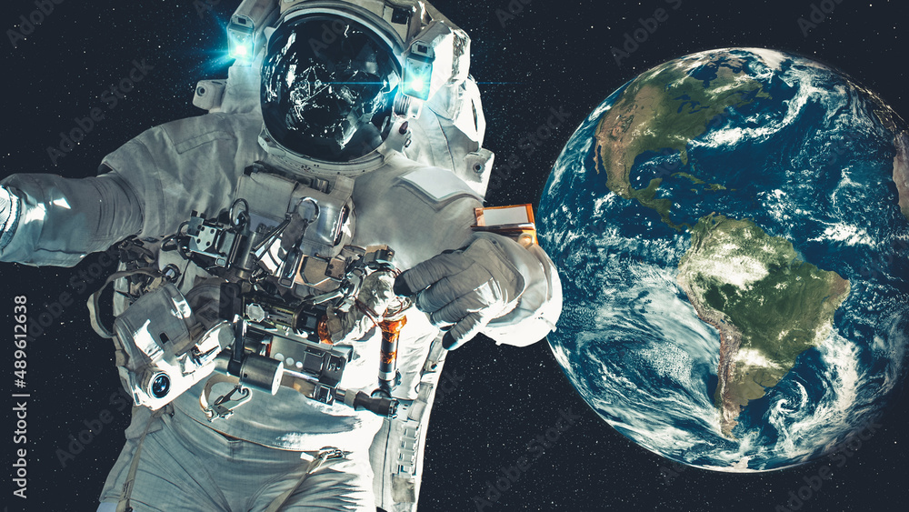 Astronaut spaceman do spacewalk while working for spaceflight mission ...