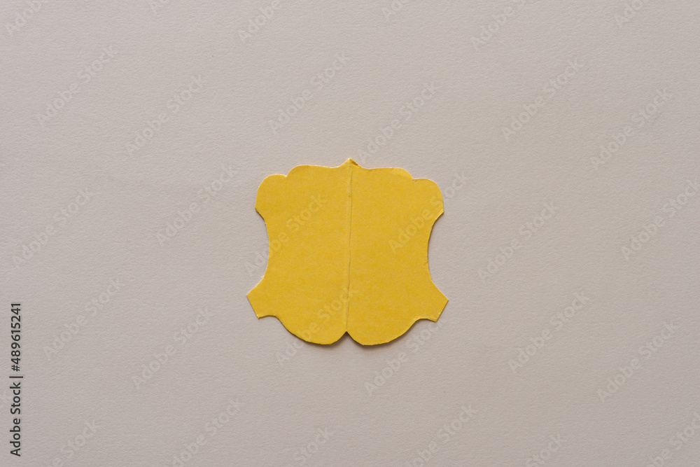 isolated paper shield on a paper surface Stock Photo | Adobe Stock