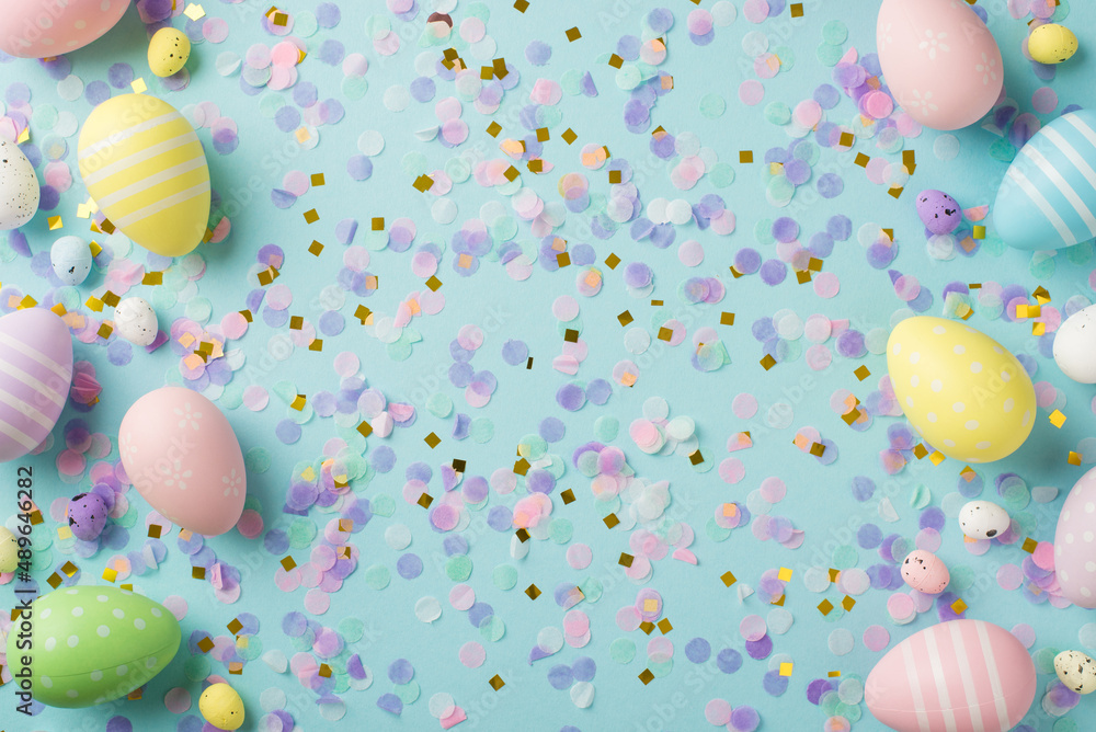 Top view photo of easter decorations different color easter eggs gold ...