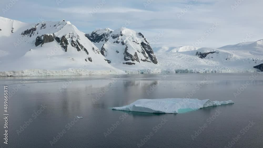 Iceberg from melting glacier. Arctic nature landscape famous for being ...