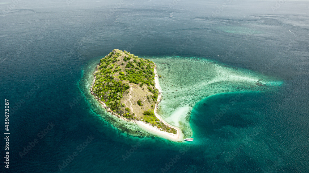 Tikus island is a beautiful small island in Komodo National Park ...