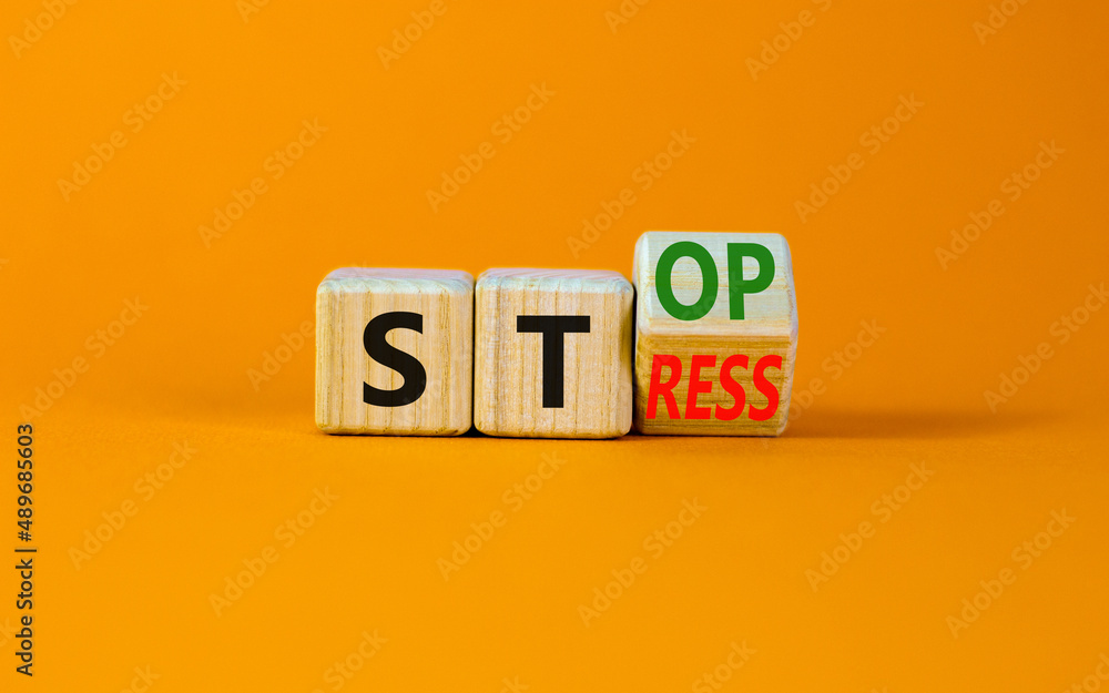 Stop stress and be health symbol. Turned the wooden cube and changed ...