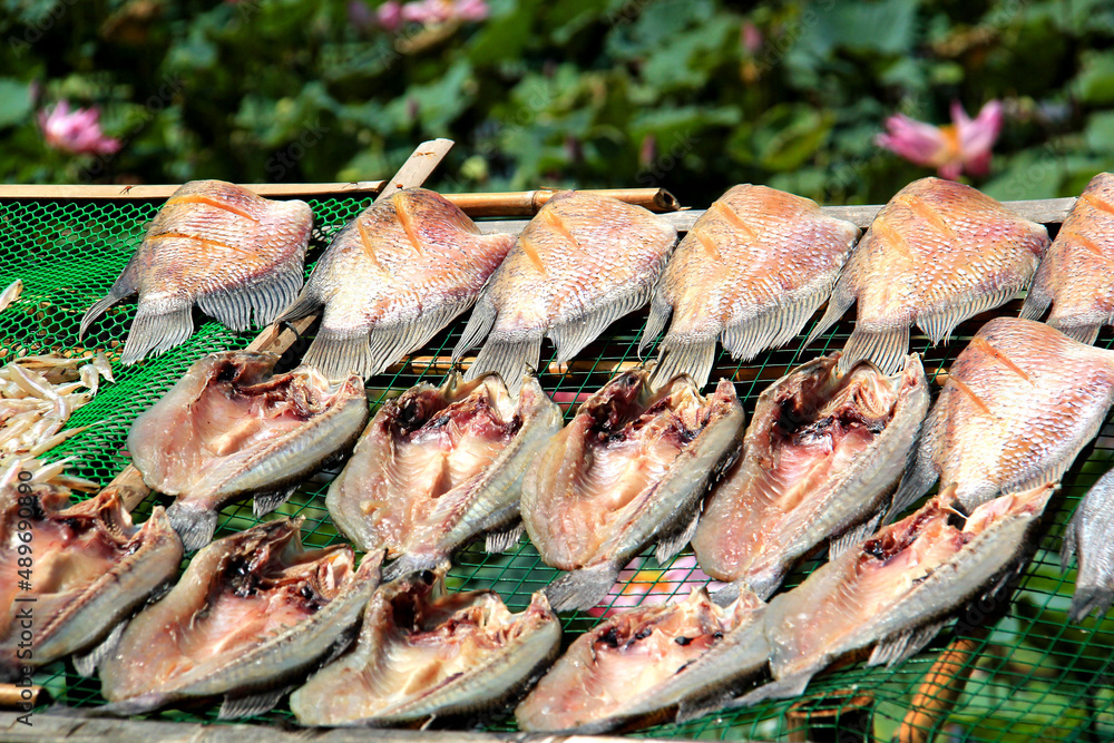 Sun-dried fish is a local wisdom used in food preservation. 스톡 사진 ...