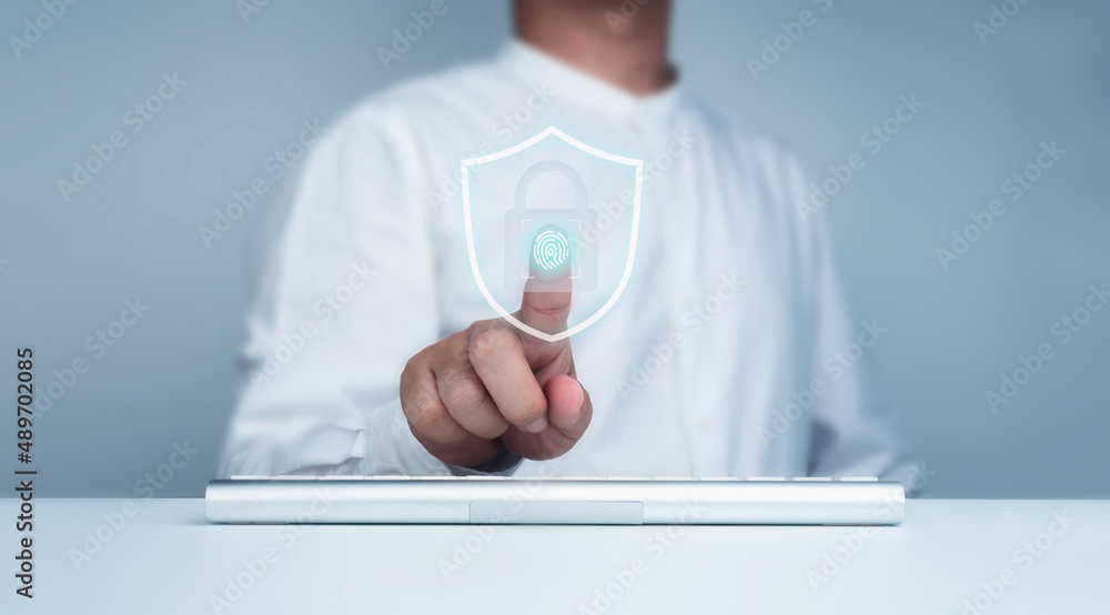 Fingerprint scan and shield, lock icon appeared on virtual screen while ...