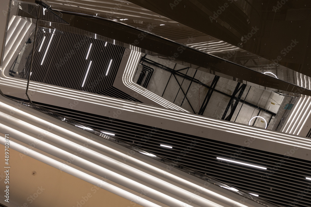 LED lighting in a shopping mall. soft focus. Ceiling lights in a ...