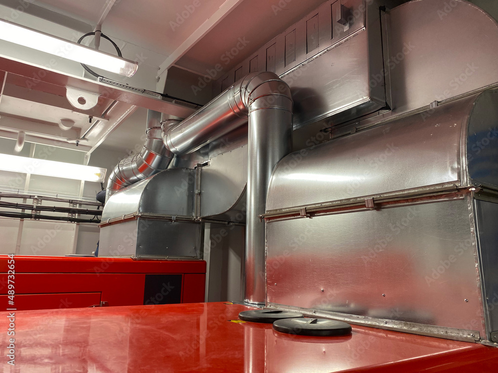 ship engine room with generators and hvac duct piping Stock Photo ...