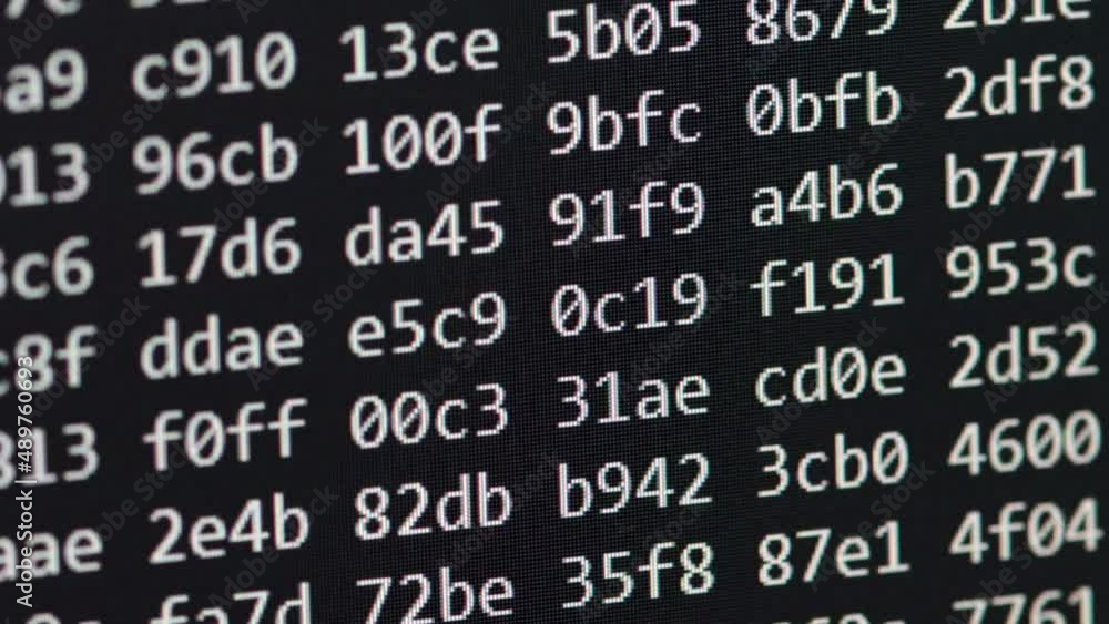 Code and numbers scrolling on computer monitor. Hacking activity ...