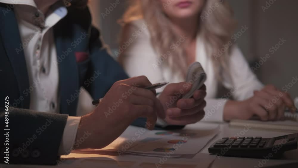 Business revenue. Teamwork discussion. Financial spreading ...