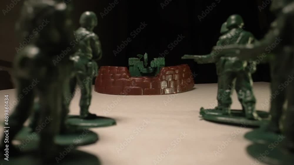 Generic plastic toy soldiers. The builder works with the insulation of ...