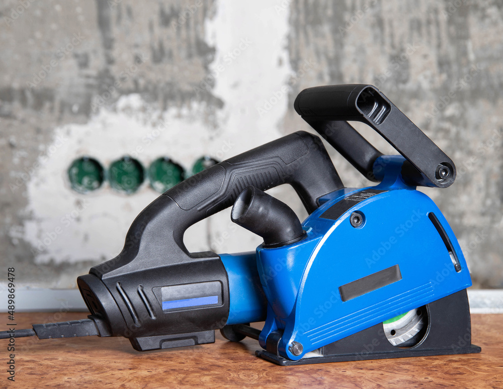 Powerful electric wall chaser for recessing in walls. construction tool ...