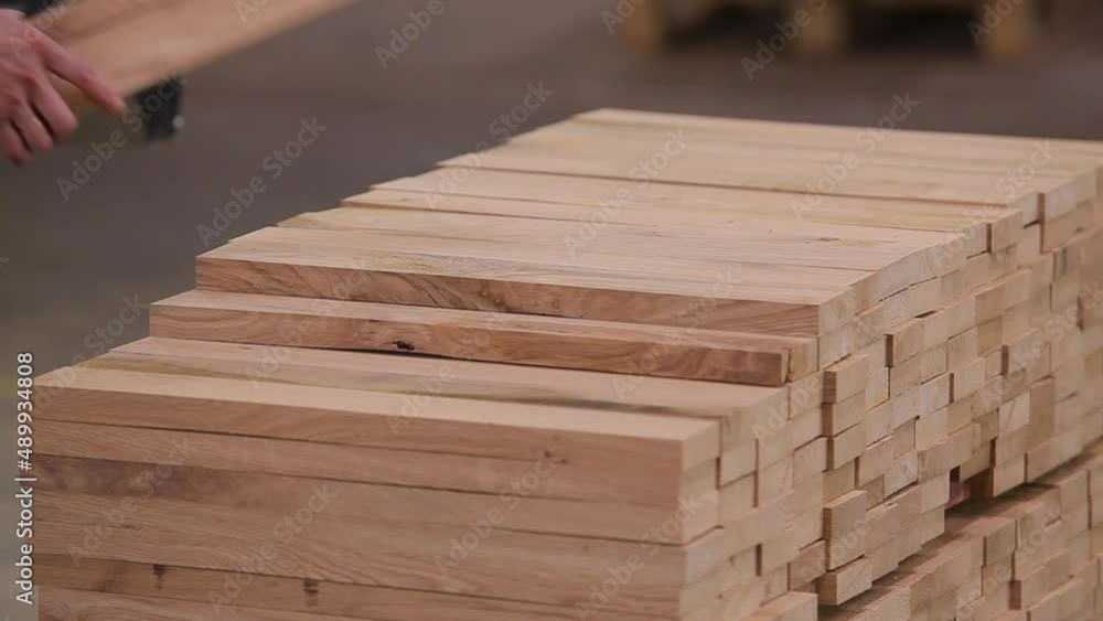 Warehouse for square processed wood bars. Preparation of bars for ...