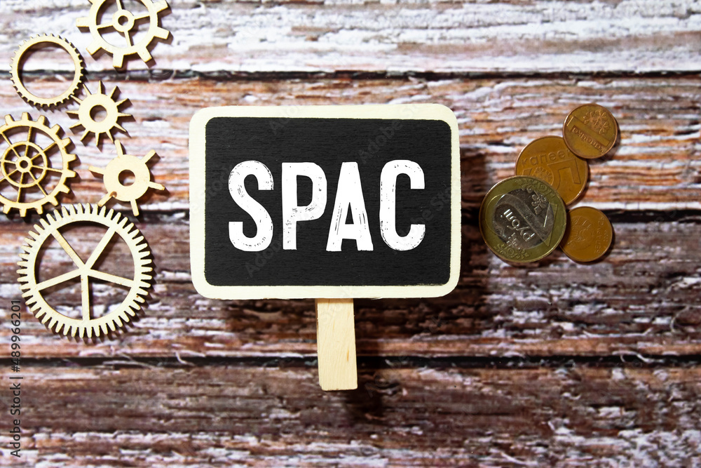 SPAC, special purpose acquisition company symbol. Words SPAC Stock ...