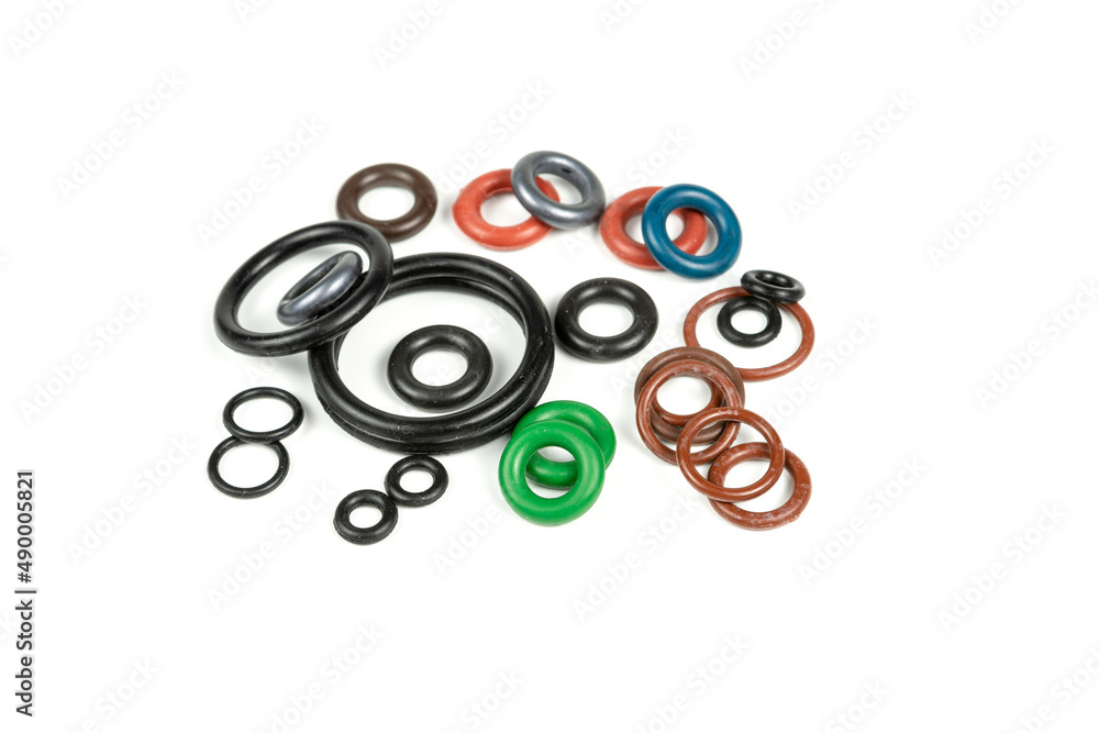 Hydraulic and pneumatic o-rings in black in different sizes on a white ...