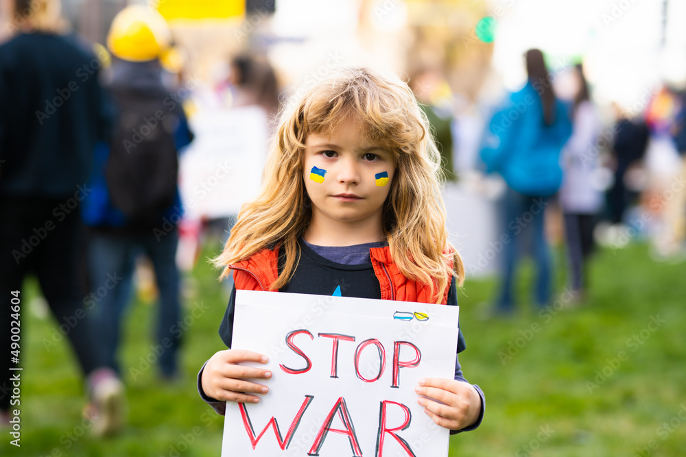 War in Ukraine. Military world aggression. Young patriot, child ...